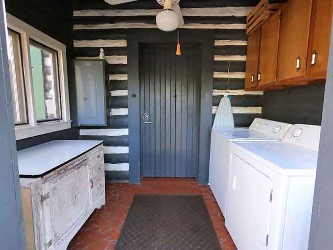 Even the laundry room has character here. Those old logs don't take a day off, not even for chores.
