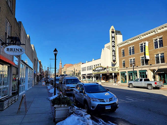 The Warner Theatre marquee standing tall, proof that small cities can dream big.