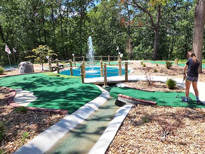 Mini golf with a fountain feature tucked into the Missouri trees, because why not add more fun?