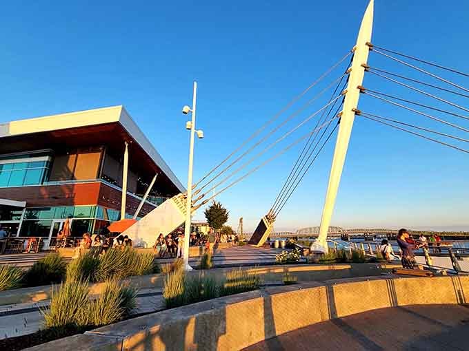 Golden hour hits the waterfront's cable sculpture and suddenly everyone looks like they're in a movie they didn't audition for.
