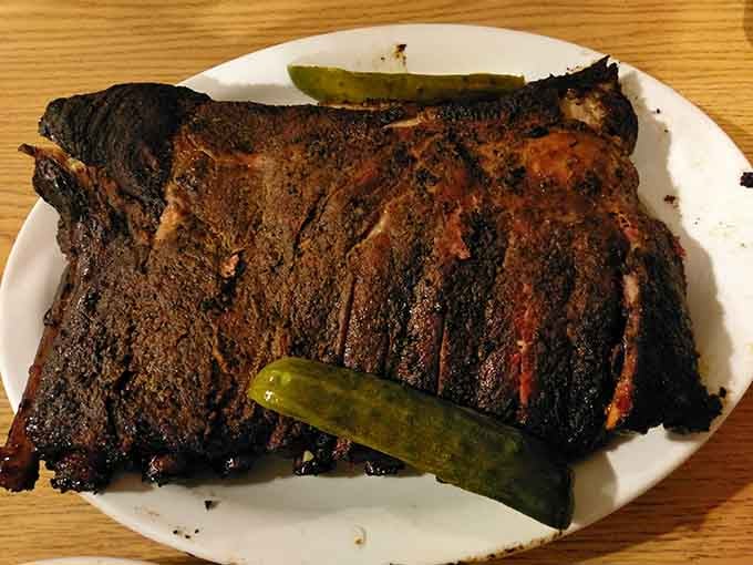 A full slab of ribs so beautifully smoked, it deserves its own zip code and a standing ovation.