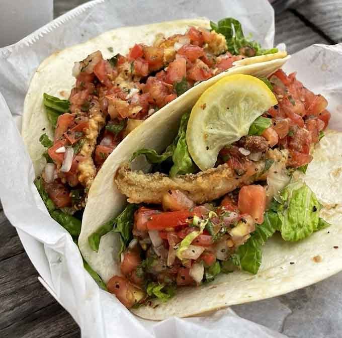 Fish tacos loaded with fresh pico de gallo and crispy fish. Simple ingredients, extraordinary results. Grab extra napkins.