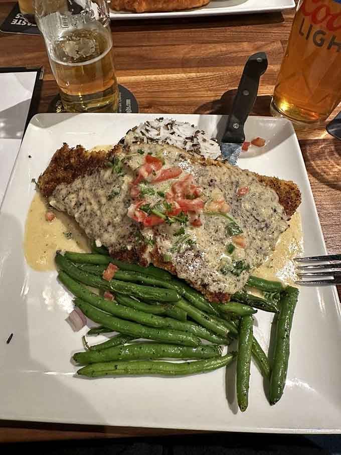 Cold beer, great company, and a walleye fillet that makes everything else on the table feel slightly jealous.