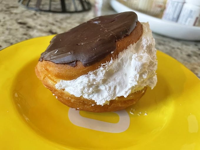Chocolate on top, clouds of marshmallow cream inside, this donut is basically dessert wearing a very convincing disguise.