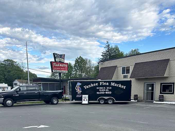 The parking lot alone tells you this place means business, and the trailer out front is basically a rolling billboard of joy.