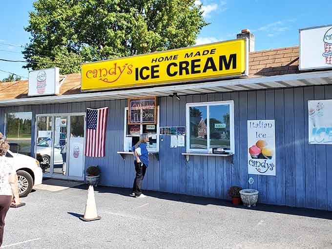 Candy's bright yellow sign against a blue summer sky is roadside Americana at its most delicious and unapologetic.