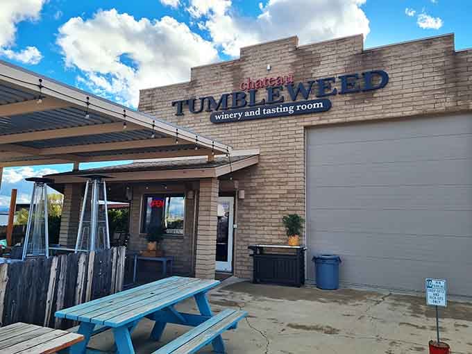 Bright blue picnic tables and a bold sign that says exactly what this cheerful Clarkdale spot is all about.