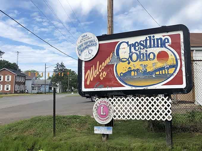 That well-worn welcome sign, complete with a softball championship badge, tells you Crestline celebrates its wins and wears them proudly.
