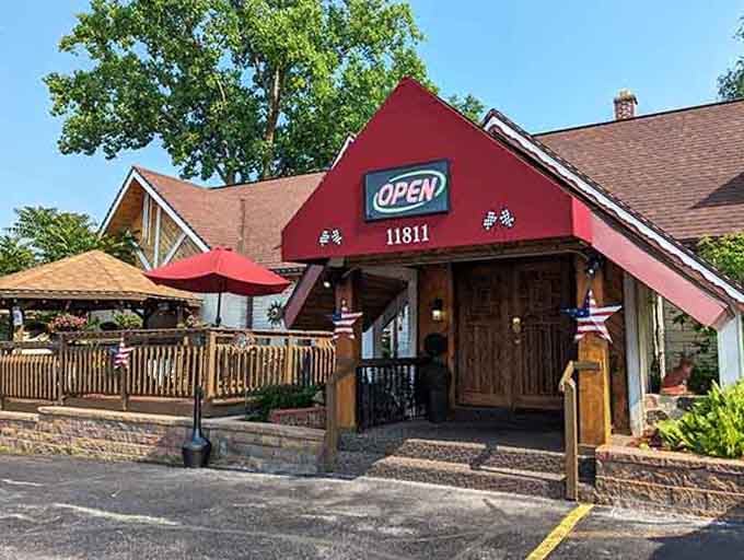 Red awning, American flags, and a massive wooden door: Diamond Jim's entrance practically rolls out the red carpet before you've even ordered.
