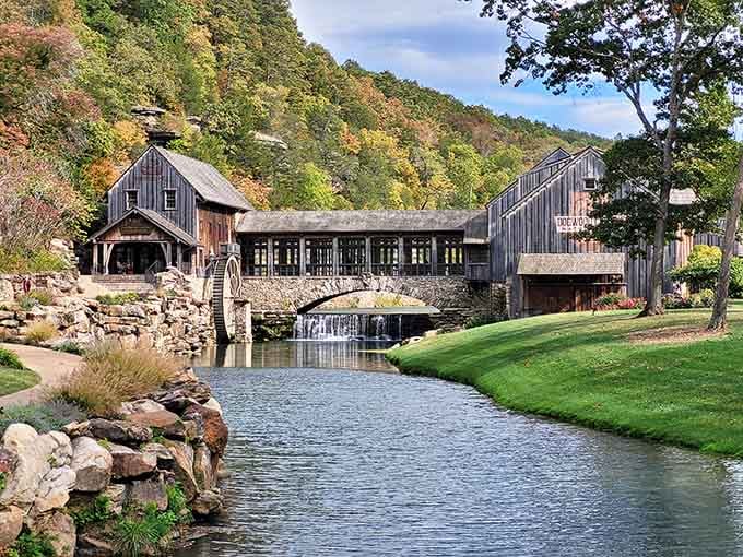 This rustic bridge over crystal-clear water looks like something from a Thomas Kinkade painting come to life.