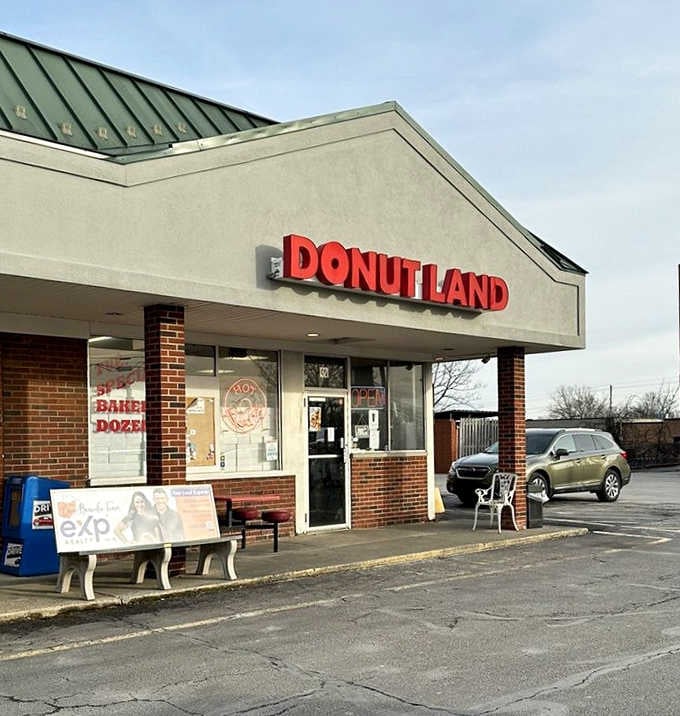 Bold red letters spelling "Donut Land" against a grey winter sky feel like a warm hug on a cold morning.