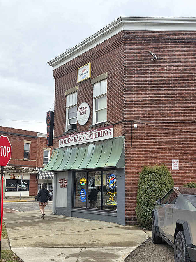 That green copper awning and a "Food, Bar, Catering" banner tell you the Edinboro Hotel means to cover all your bases.