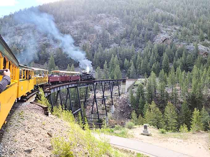 That yellow Georgetown Loop train crossing the Devil's Gate trestle is the kind of sight that stops conversations mid-sentence.