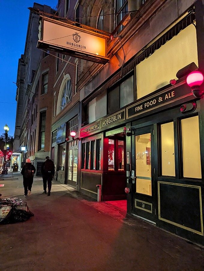 The glowing storefront at twilight invites you into a fantasy tavern straight from your favorite storybook adventure.