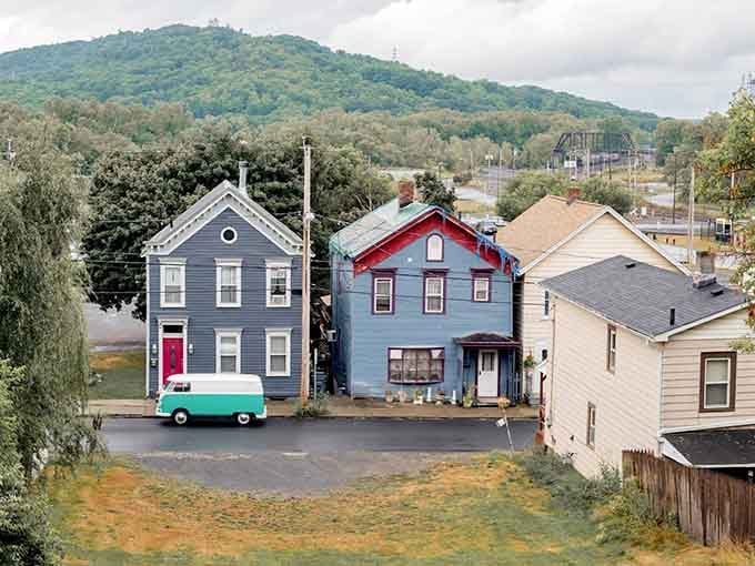 Hudson's colorful row houses line up like a box of crayons, each one adding character to the streetscape.