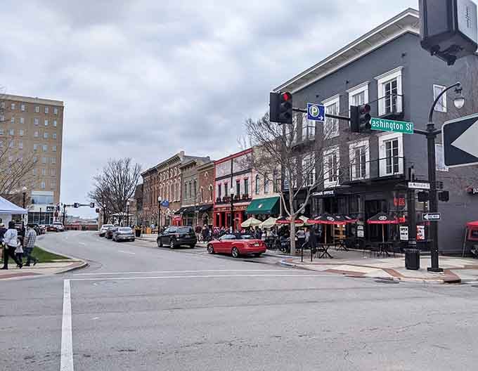 Historic storefronts line these inviting streets where every awning promises another delicious discovery waiting inside.