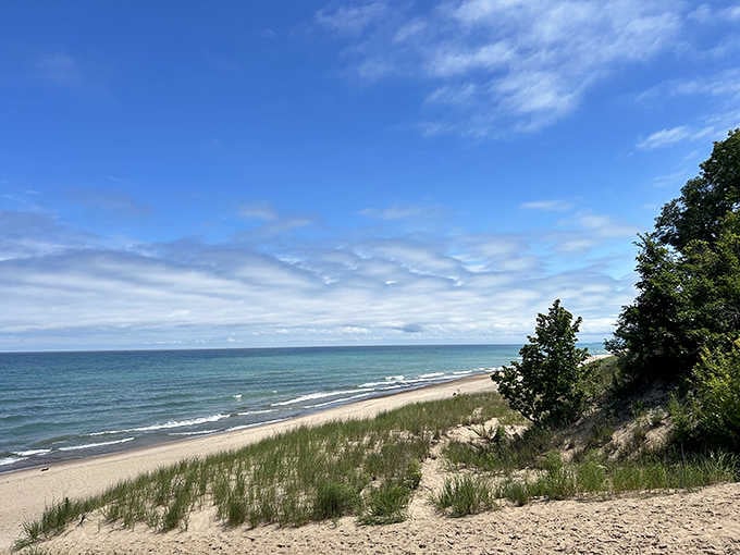 That endless stretch of sand and turquoise water is Lake Michigan reminding Indiana it won the shoreline lottery.