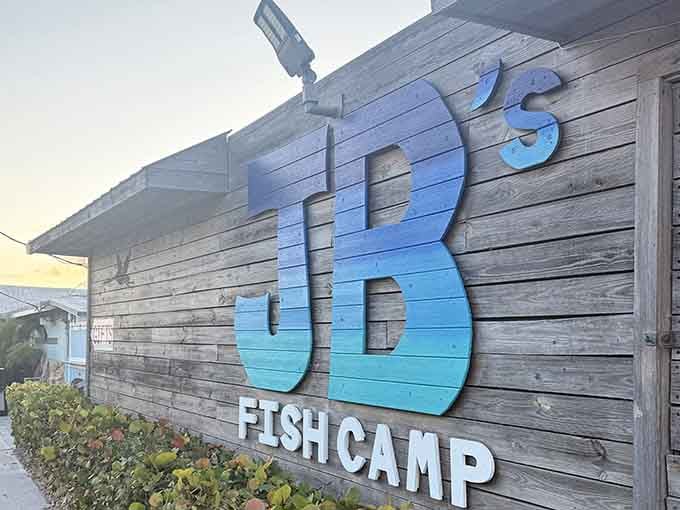 That ocean-blue sign against weathered wood tells you everything: real Florida dining lives here.