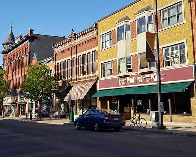 Hogan Brothers Acoustic Cafe anchors this golden-hour Northfield streetscape like a warm handshake from a town that genuinely likes people.