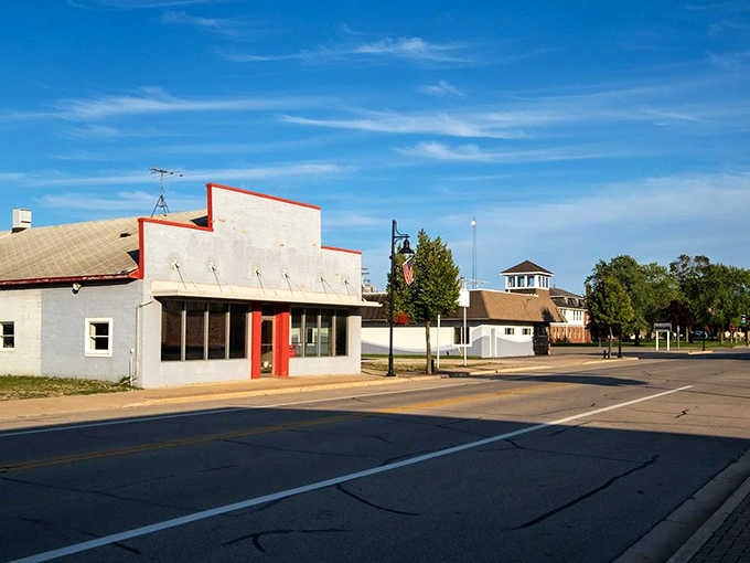 Rogers City's quiet main street catches the morning light beautifully, proof that the best discoveries often happen on the roads less traveled.