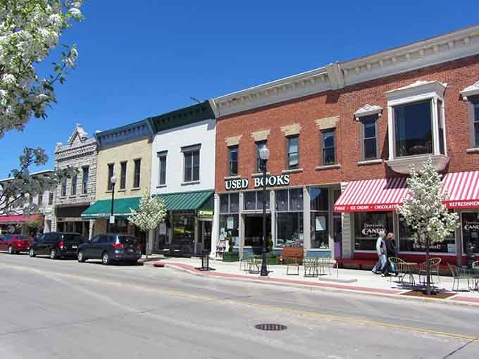Sturgeon Bay's sunny main street welcomes you with used bookshops, sweet candy stores, and blooming trees lining the sidewalk!