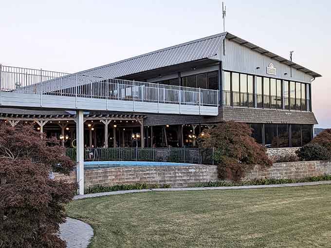 Two stories of windows, manicured grounds, and Lake Hartwell glowing at golden hour. The Galley means business.