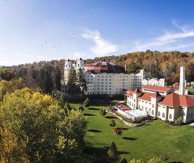 Nestled among fall foliage, West Baden Springs Hotel looks like someone dropped a European palace into Indiana's hills.