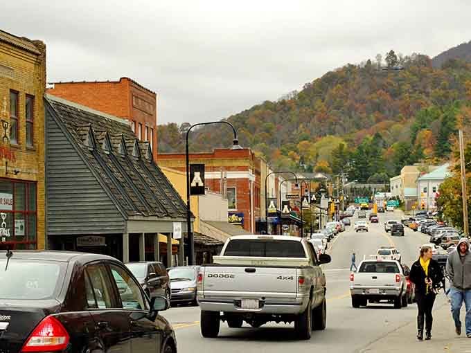 Those autumn hills create a postcard-perfect frame for a main street that's buzzing with actual life.