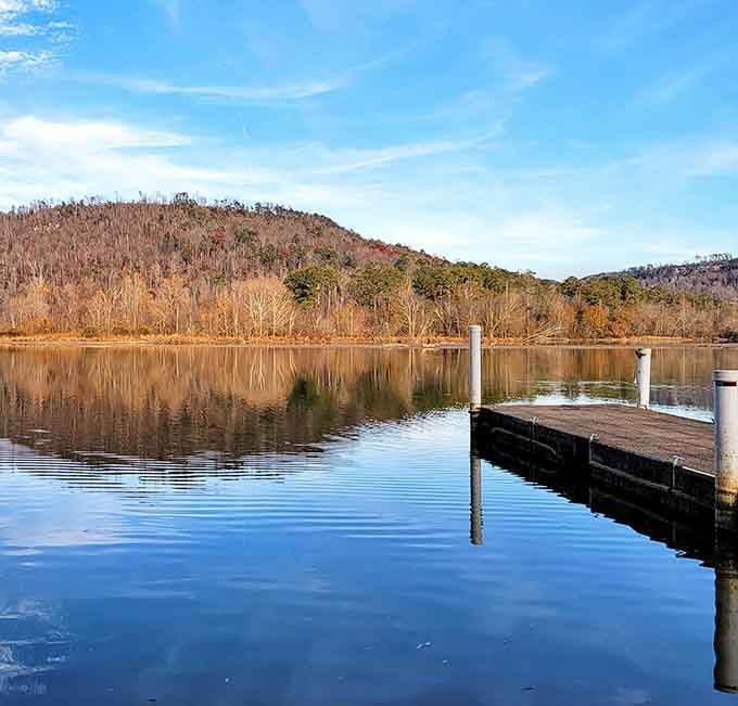 Autumn strips the hillside to warm copper and gold, and Buck's Pocket dock reflects every gorgeous bit of it.