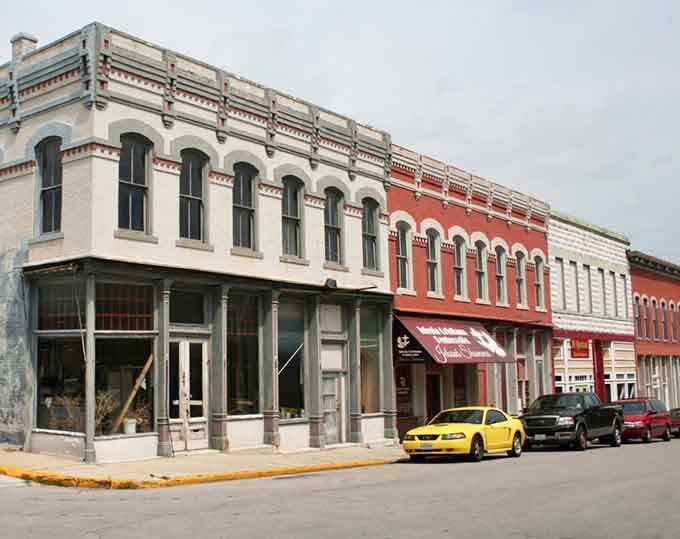 These ornate Victorian storefronts along Carthage's main street have more decorative detail per square foot than most entire city blocks elsewhere.