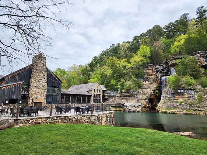 The waterfall tumbling down the bluff beside those charming buildings creates pure Ozark magic.