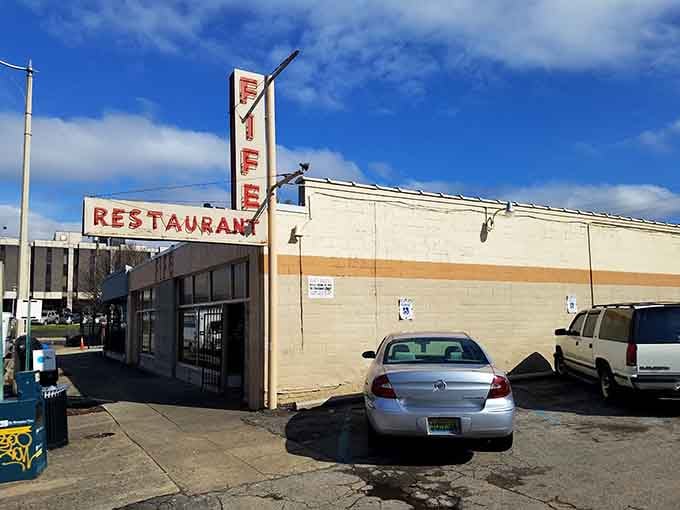 That tall vintage sign reaching toward a brilliant blue sky says Fife's has always stood its ground.
