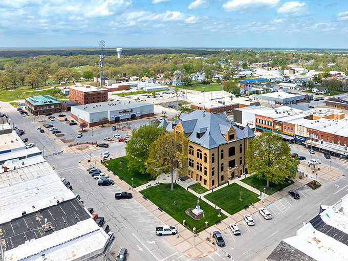 Kirksville's courthouse anchors the town square like a proud grandfather at a family reunion, its steep slate roof and golden stone walls impossible to ignore from any angle.