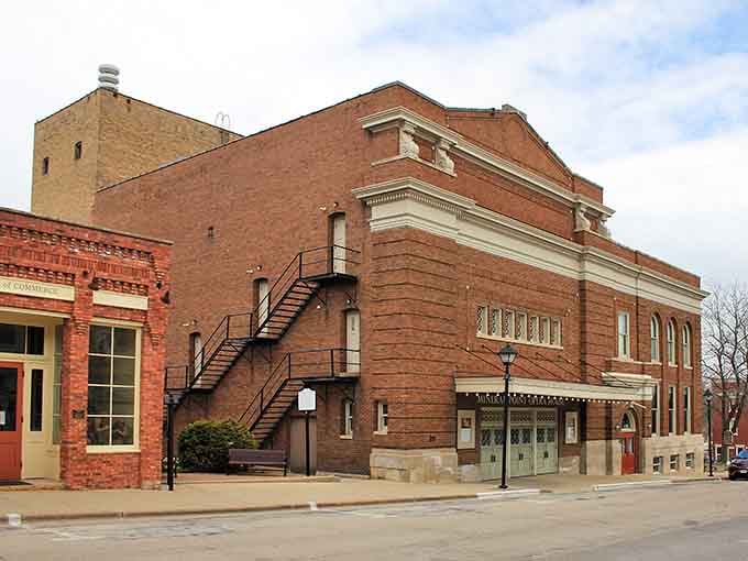 A stately brick building stands like a proud elder statesman, daring you to walk past without stopping.