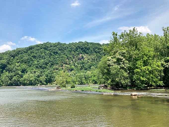 Rocky outcroppings rise above the New River's wide, glassy surface, proving Virginia's scenery needs zero filter.