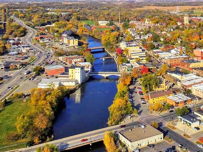 From above, the Cannon River ribbons through Northfield's autumn canopy like nature decided to show off just for the cameras.