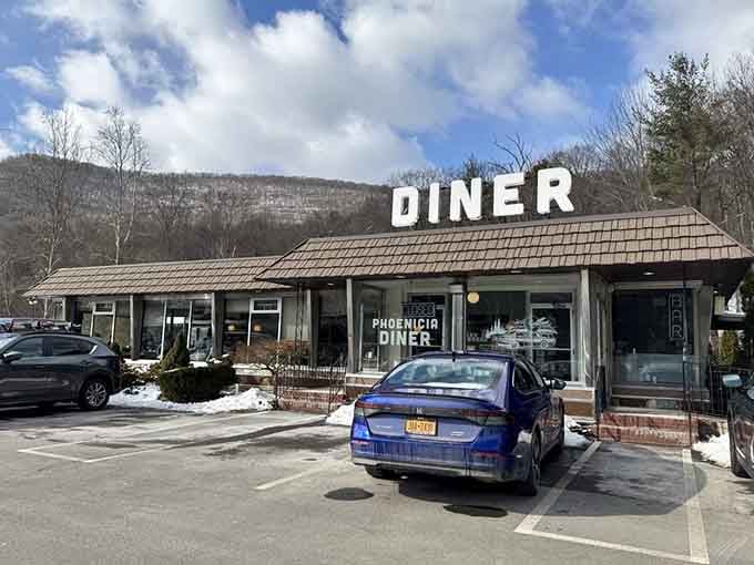 Snow on the ground, mountains at your back, and the Phoenicia Diner glowing warmly ahead, drive toward the light.