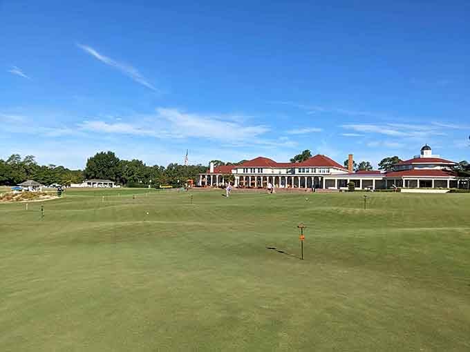 The Pinehurst Resort clubhouse sits behind velvety green fairways like a postcard that somehow got even better in real life.