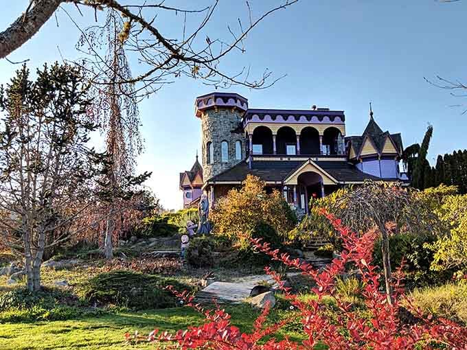 Autumn foliage frames this whimsical castle perched on its hillside like a crown jewel in nature's treasure box.