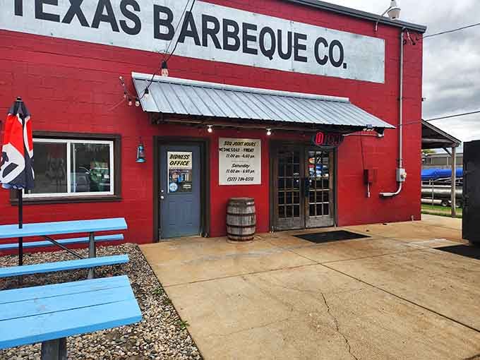 The bright red exterior and casual outdoor seating invite you to slow down and savor some authentic Texas-style cooking.