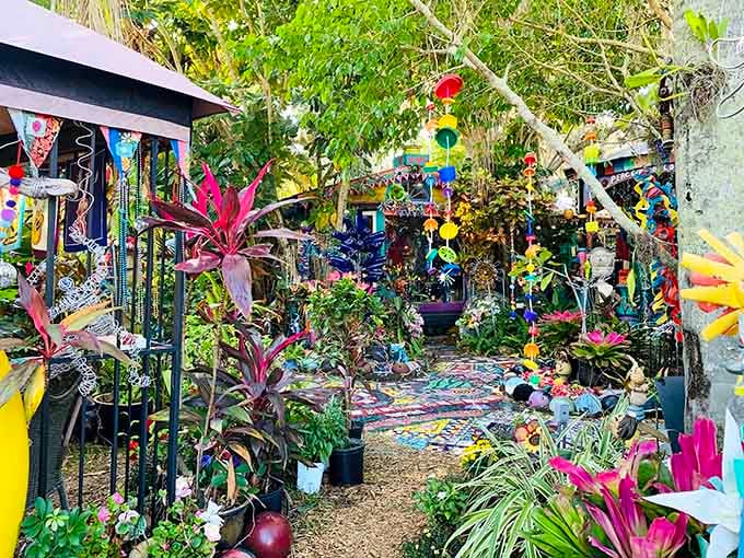 Step through the gate at Whimzeyland and suddenly every hanging ornament, tropical plant, and mosaic tile is competing for your full attention.