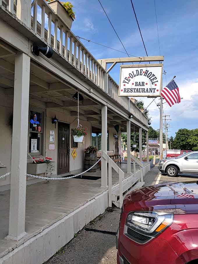 Flower boxes blooming on the upper balcony give this classic tavern a cheerful, lived-in charm that chain restaurants simply can't manufacture.