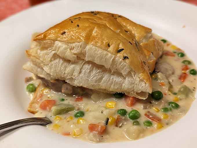 That flaky pastry crust hiding a creamy, vegetable-filled interior is exactly what your grandmother would have made on a cold evening.