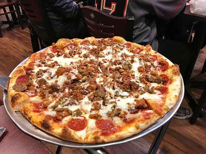 Loaded with pepperoni and sausage, this pizza arrived like it had somewhere important to be and absolutely meant it.