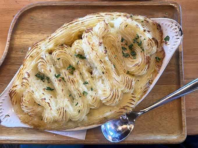 Shepherd's pie presented like fine dining proves comfort food doesn't have to apologize for being fancy or vice versa.