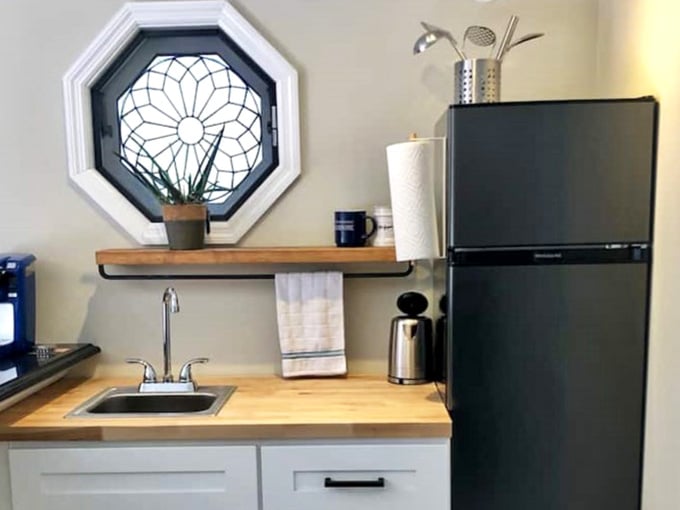 The octagonal stained glass window above the kitchenette is the kind of detail that makes you feel genuinely cared for.