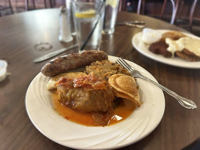 The Warsaw Medley puts a cabbage roll, bratwurst, and sauerkraut on one plate. Poland called, and it approves.