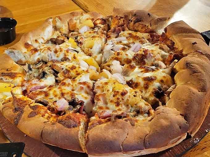 Loaded with toppings from edge to edge, this mountain pie means business. Your appetite called, and it said yes.