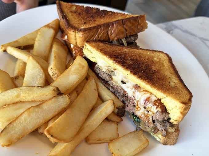 Golden toast, a juicy patty, and a side of fries that deserve their own fan club.