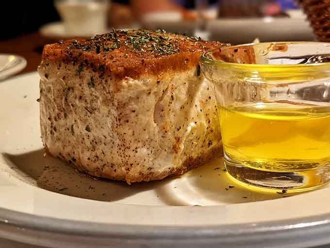 A thick, herb-crusted swordfish steak with olive oil on the side. Landlocked Ohio just called the ocean's bluff.